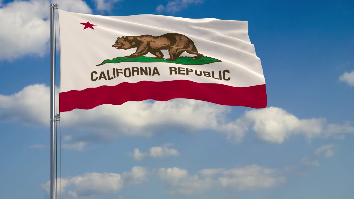 Flag of California - US state fluttering in the wind against a cloudy ...